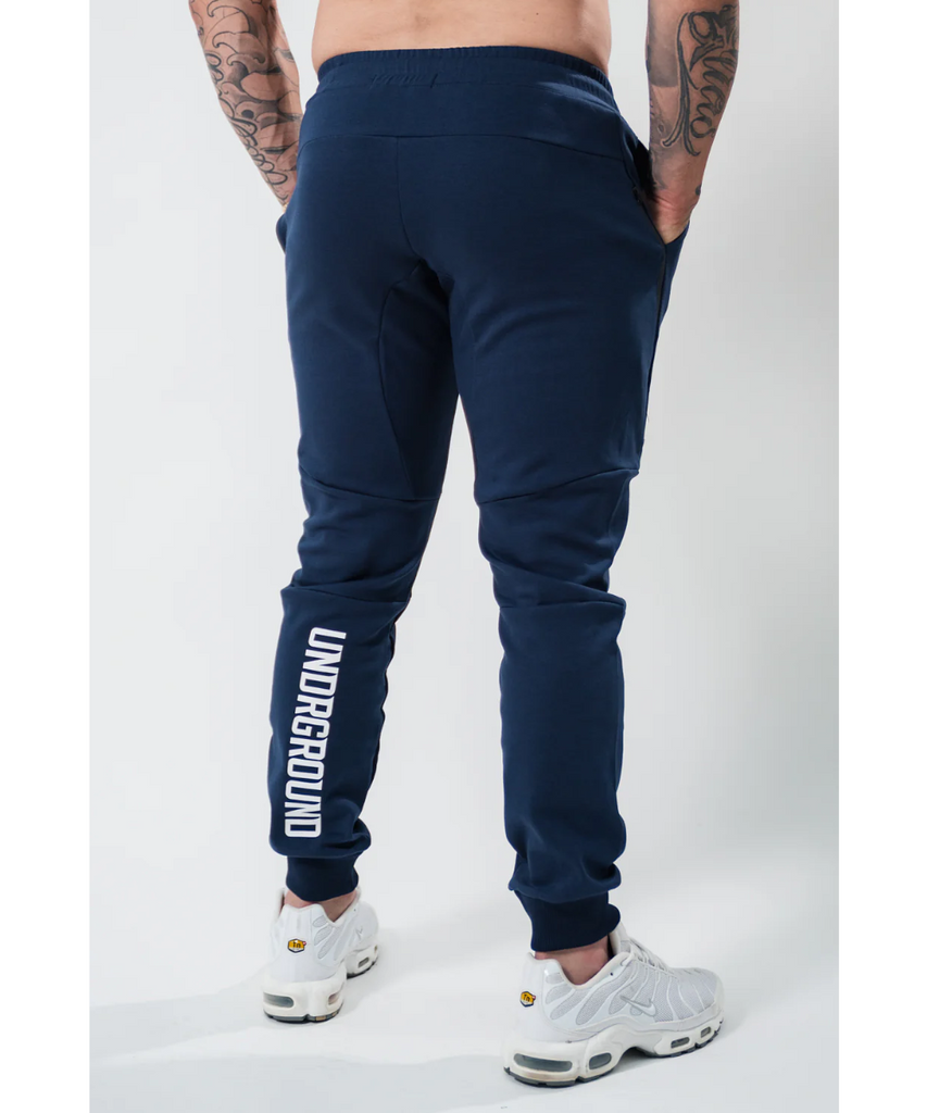 SHOP NOW: UNDRGROUND Tapered Trackies in Washed Navy at ShoeGrab